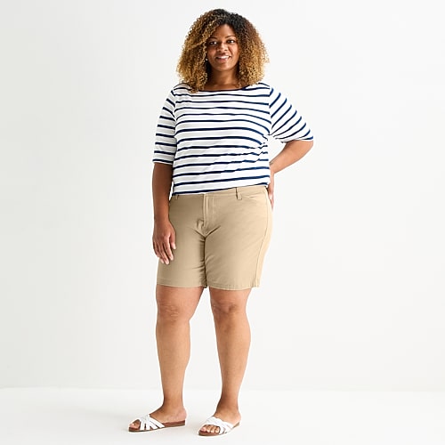 Click here for St. Johns Bay Womens 8 Mid Rise Plus Chino Short... prices