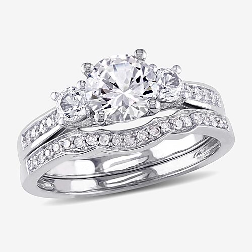 Click here for Lab Created White Sapphire & 1/7 CT. T.W. Diamond... prices