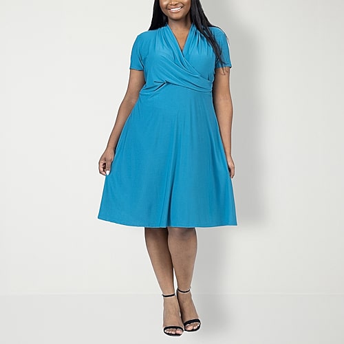Click here for 24seven Comfort Apparel Plus Size Short Sleeve Rou... prices