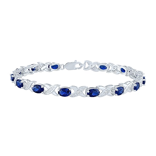 Click here for Womens Diamond Accent Lab Created Blue Sapphire St... prices