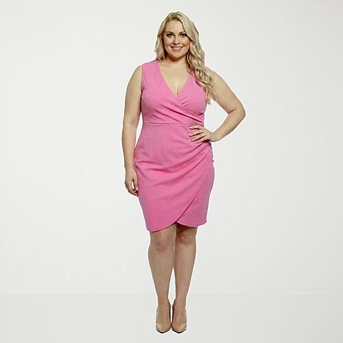 Click here for 24seven Comfort Apparel Plus Size Faux Wrap Tulip... prices