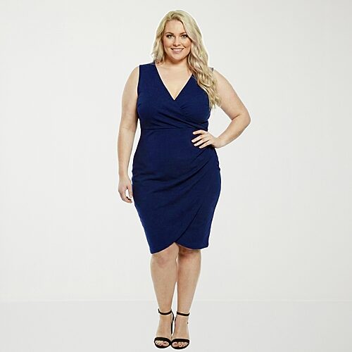 Click here for 24seven Comfort Apparel Plus Size Faux Wrap Tulip... prices