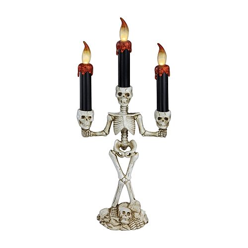 Click here for 14.5 Dripping Candle Skeleton Halloween Candelabra... prices