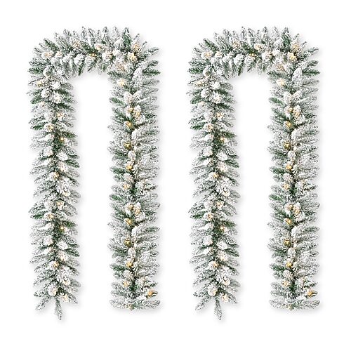 Click here for Glitzhome 2pc 6ft Pre-Lit Flocked Indoor Christmas... prices