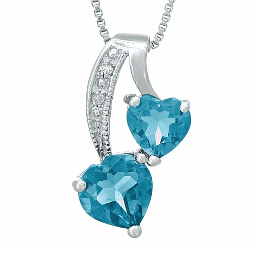 Click here for Genuine Blue Topaz and Diamond-Accent Sterling Sil... prices