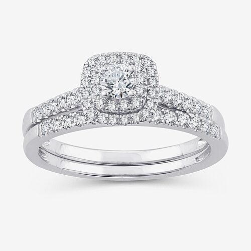 Click here for 1/2 CT.T.W. Natural Diamond Halo Bridal Set 10K or... prices