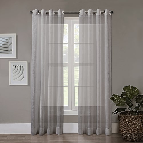 Click here for Regal Home Crushed Voile Solid Grommet Top Sheer S... prices