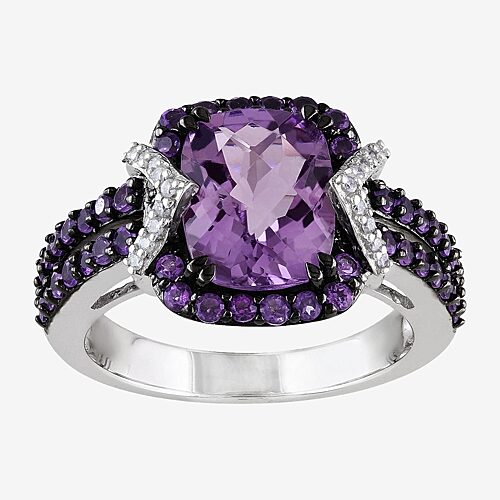 Click here for Genuine Amethyst and 1/10 CT. T.W. Diamond Sterlin... prices
