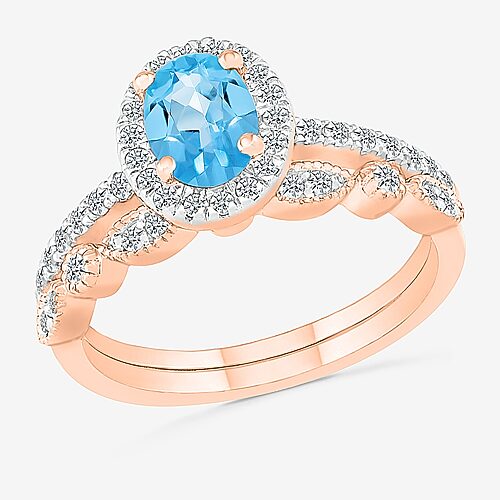 Click here for Womens Genuine Blue Topaz 14K Gold Oval Bridal Set... prices