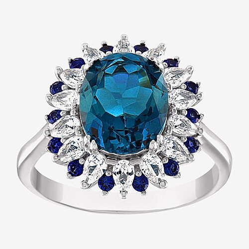 Click here for Womens Genuine Blue Topaz Sterling Silver Oval Coc... prices