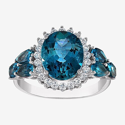 Click here for Womens Genuine Blue Topaz Sterling Silver Oval Hal... prices