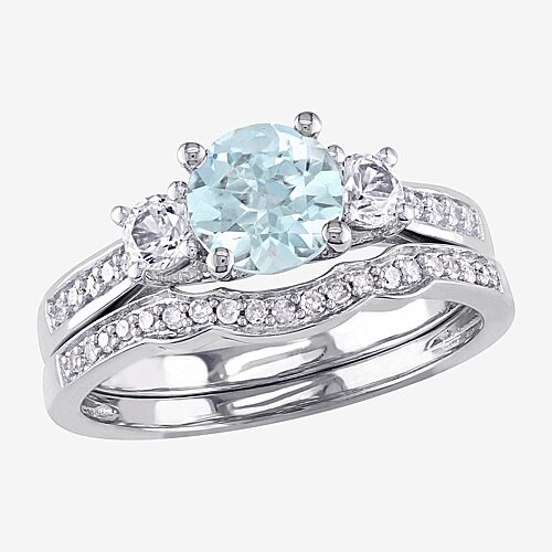 Click here for Womens 1/7 CT. T.W. Genuine Blue Aquamarine 10K Go... prices