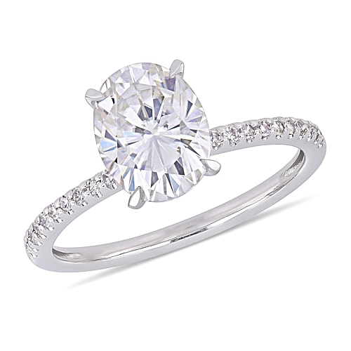 Click here for Womens 1/10 CT. T.W. White Moissanite 14K Gold Eng... prices
