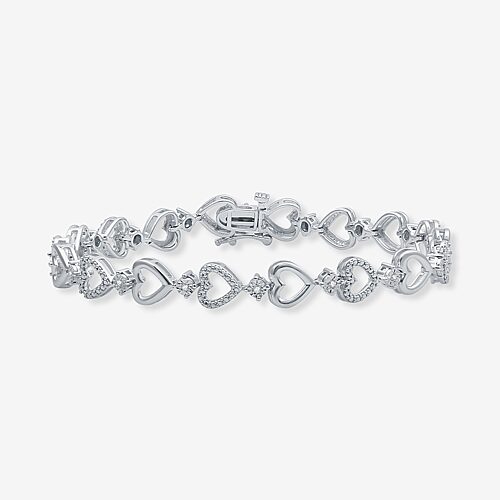 Click here for 1/10 CT.T.W. Natural Diamond Heart Tennis Bracelet... prices