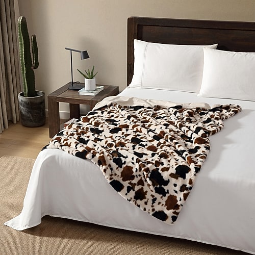 Click here for Wrangler Spotted Cow Faux Rabbit Fur Throw  50 x 7... prices