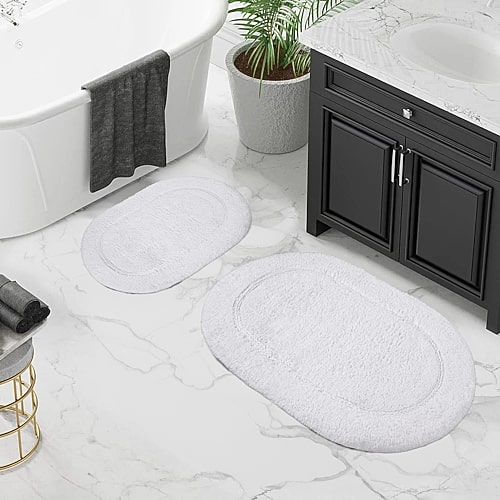 Click here for Superior Oval Solid Non-Skid Washable Cotton 2-Pc.... prices