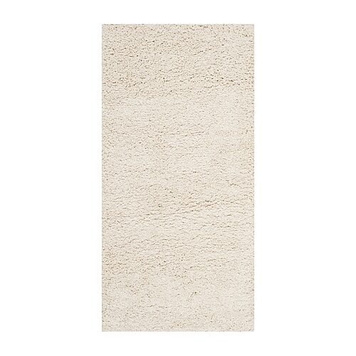 Click here for Safavieh Milan Collection Harper Solid Shag Indoor... prices