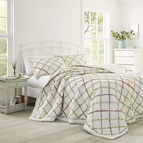 Click here for Laura Ashley Ruffle Garden Floral Reversible Quilt... prices